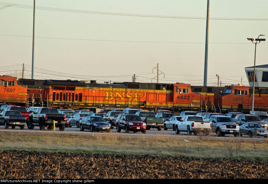 BNSF 7697 sits with big boy power.
